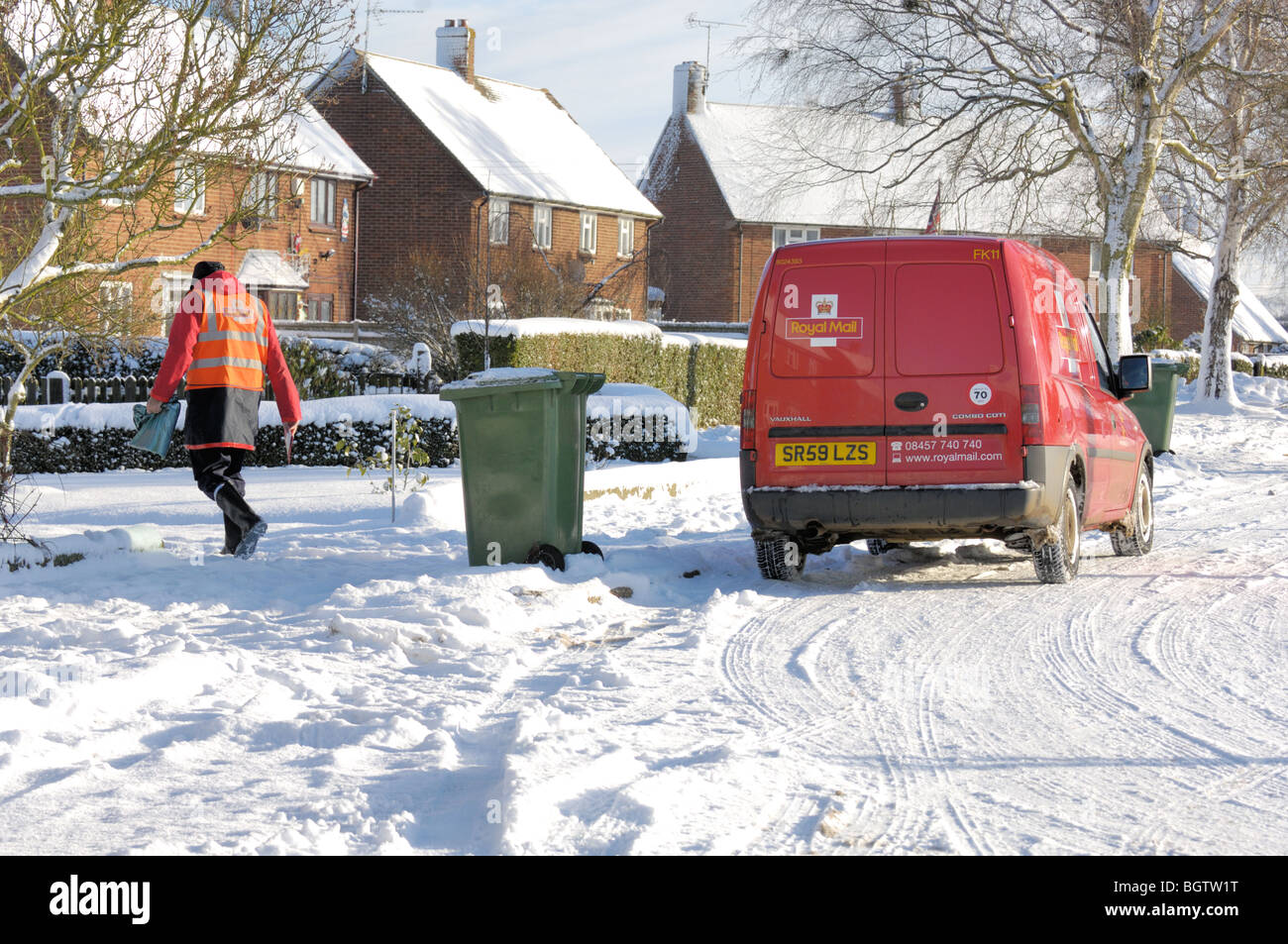 Royal mail postman village hi-res stock photography and images - Alamy