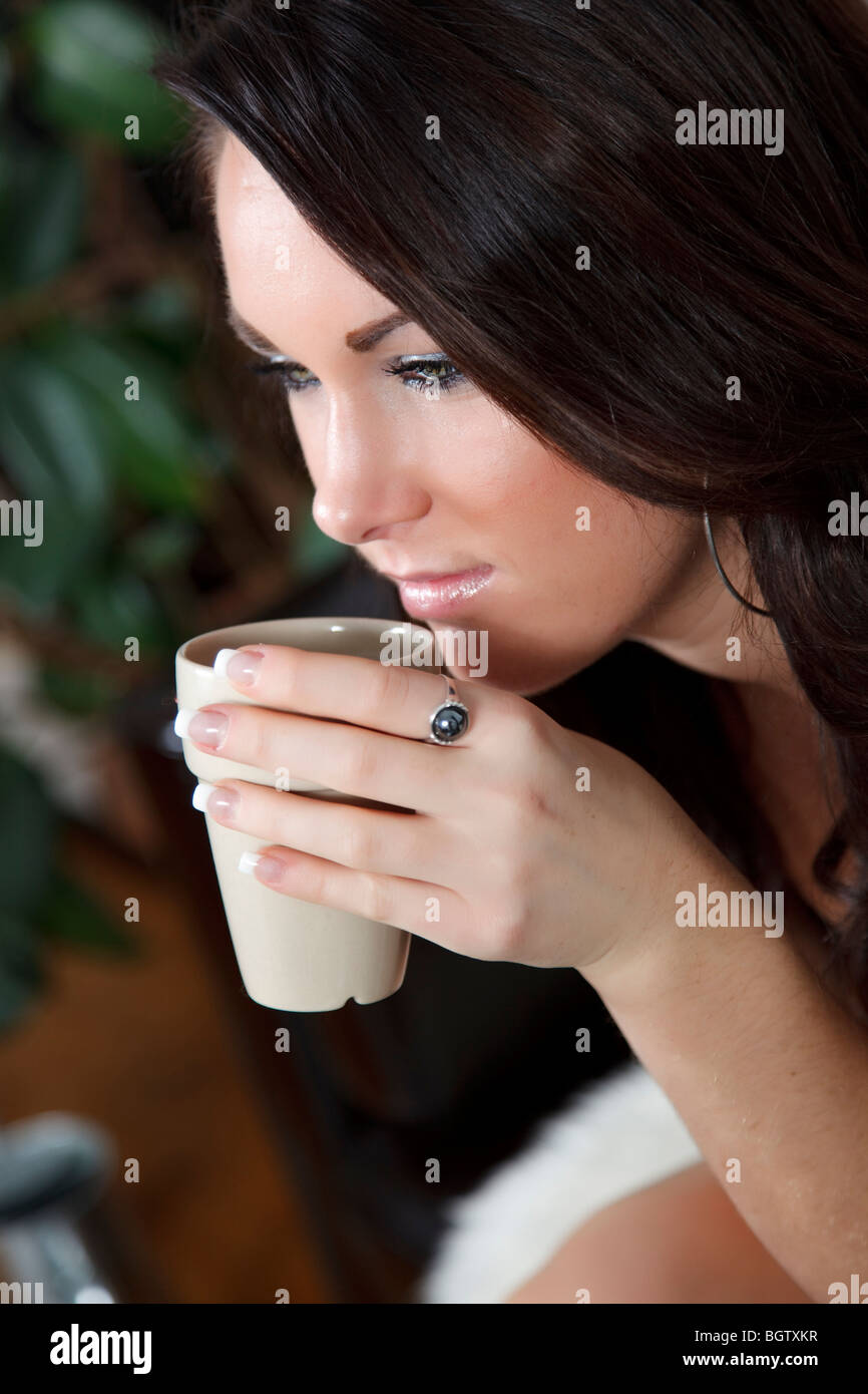 woman relaxing with mug of tea Stock Photo - Alamy