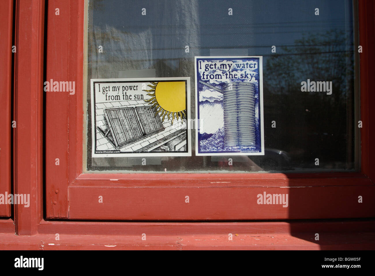Tucson, Arizona. Signs stuck in house window indicating owner uses ...