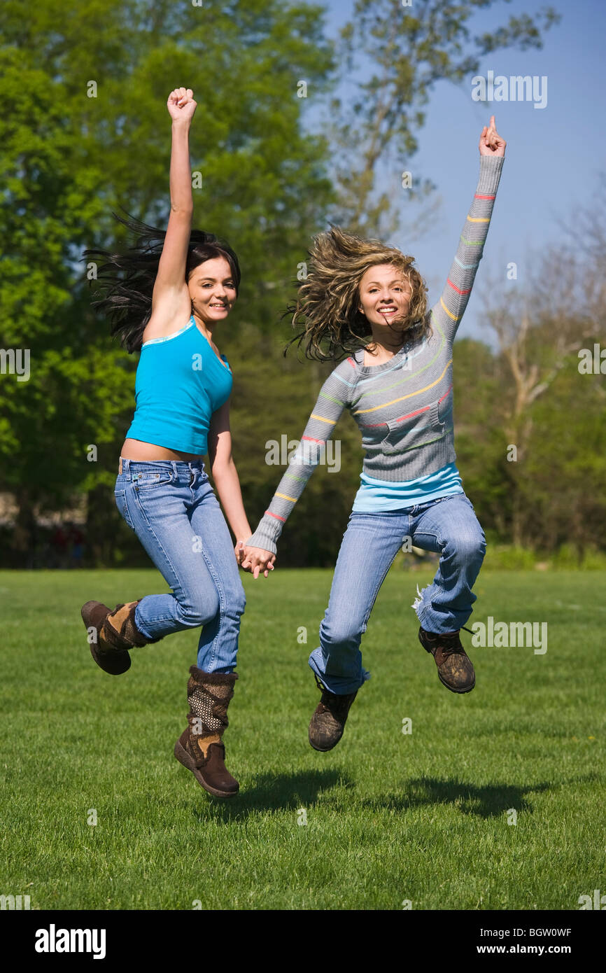 Caucasian teenage girls playing in the park Stock Photo - Alamy