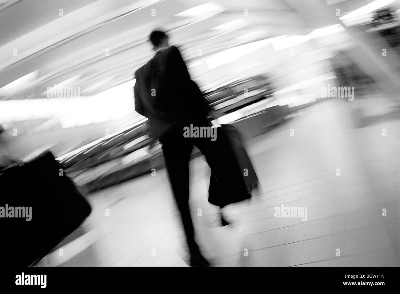 Running through airport hi-res stock photography and images - Alamy
