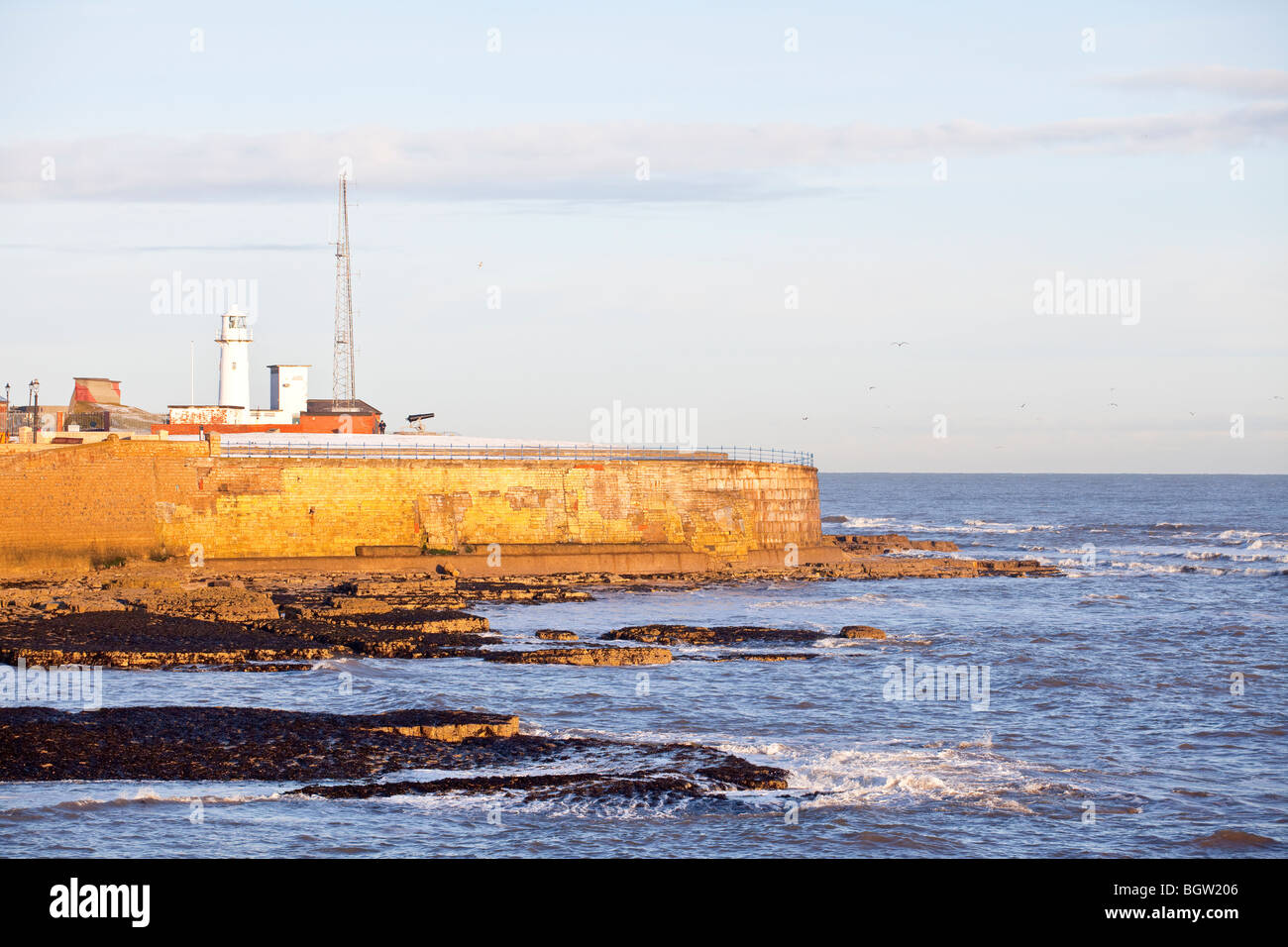A view from the heugh breakwater looking towards the lighthouse on the ...