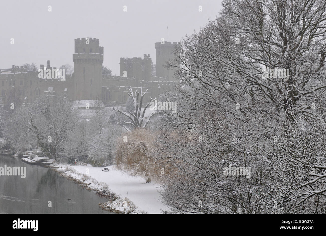 Warwick Castle and River Avon with snow, Warwickshire, England, UK ...