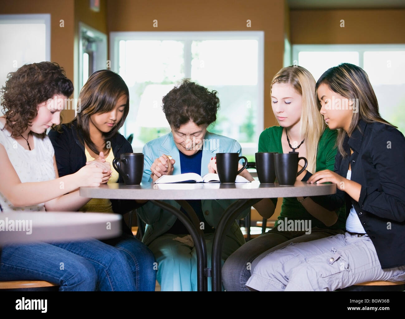 Children praying together teen hi-res stock photography and images - Alamy