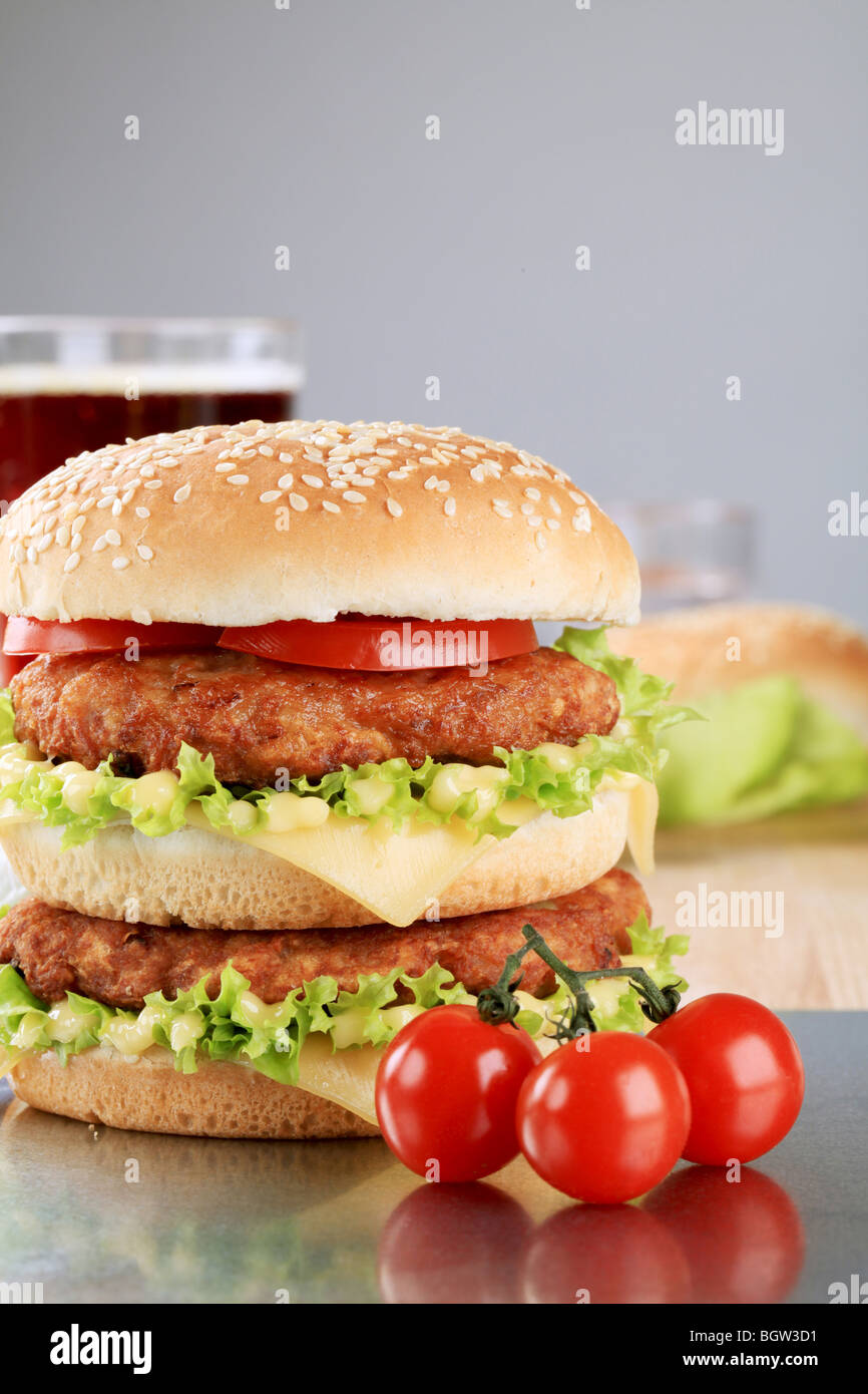 Appetizing double cheeseburger - ready to eat Stock Photo - Alamy