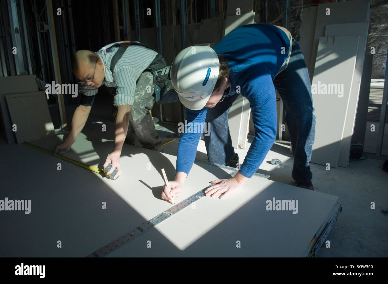 Helping community build houses hi-res stock photography and images - Alamy