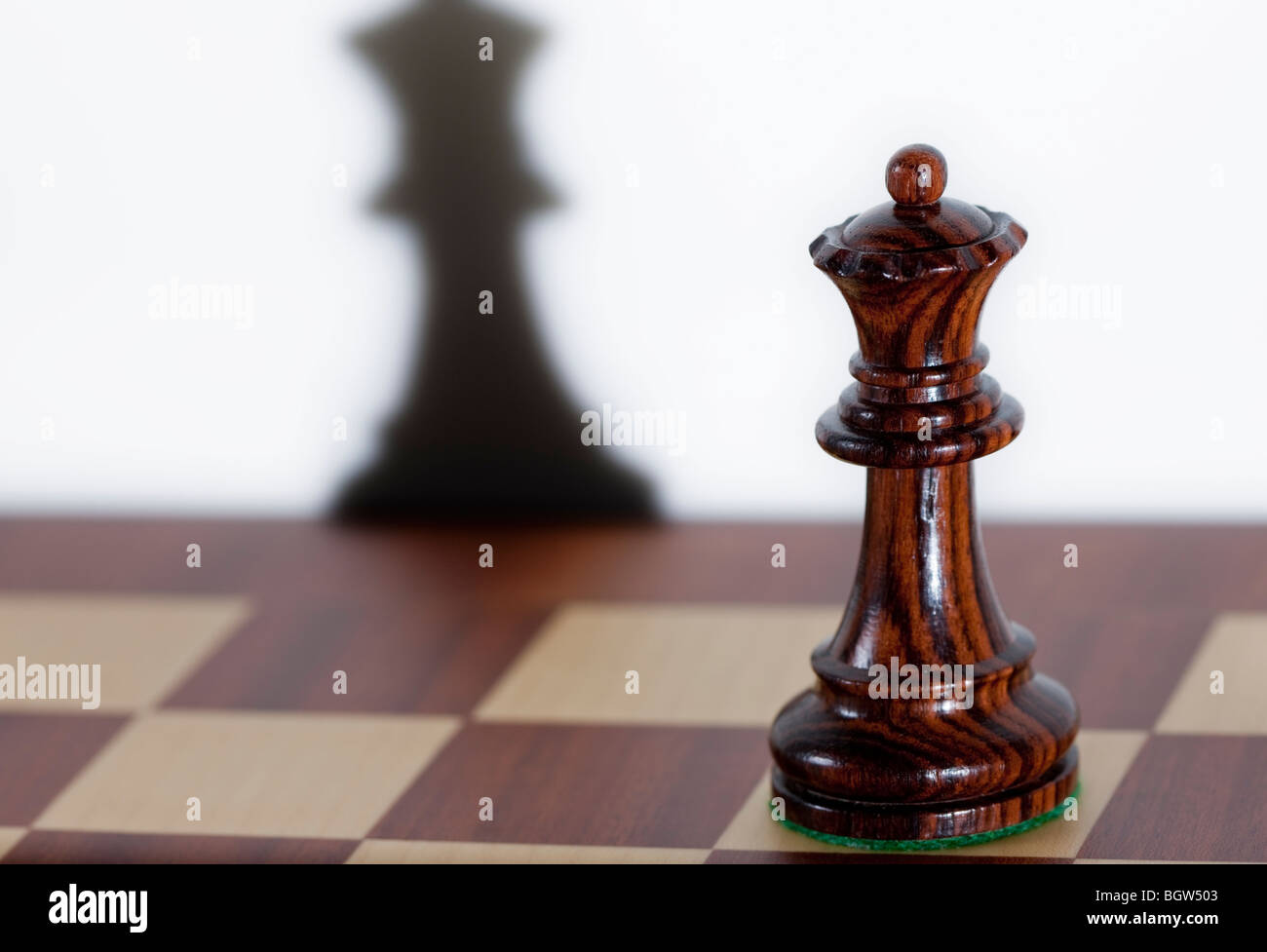 Queen chess piece shadow hi-res stock photography and images - Alamy