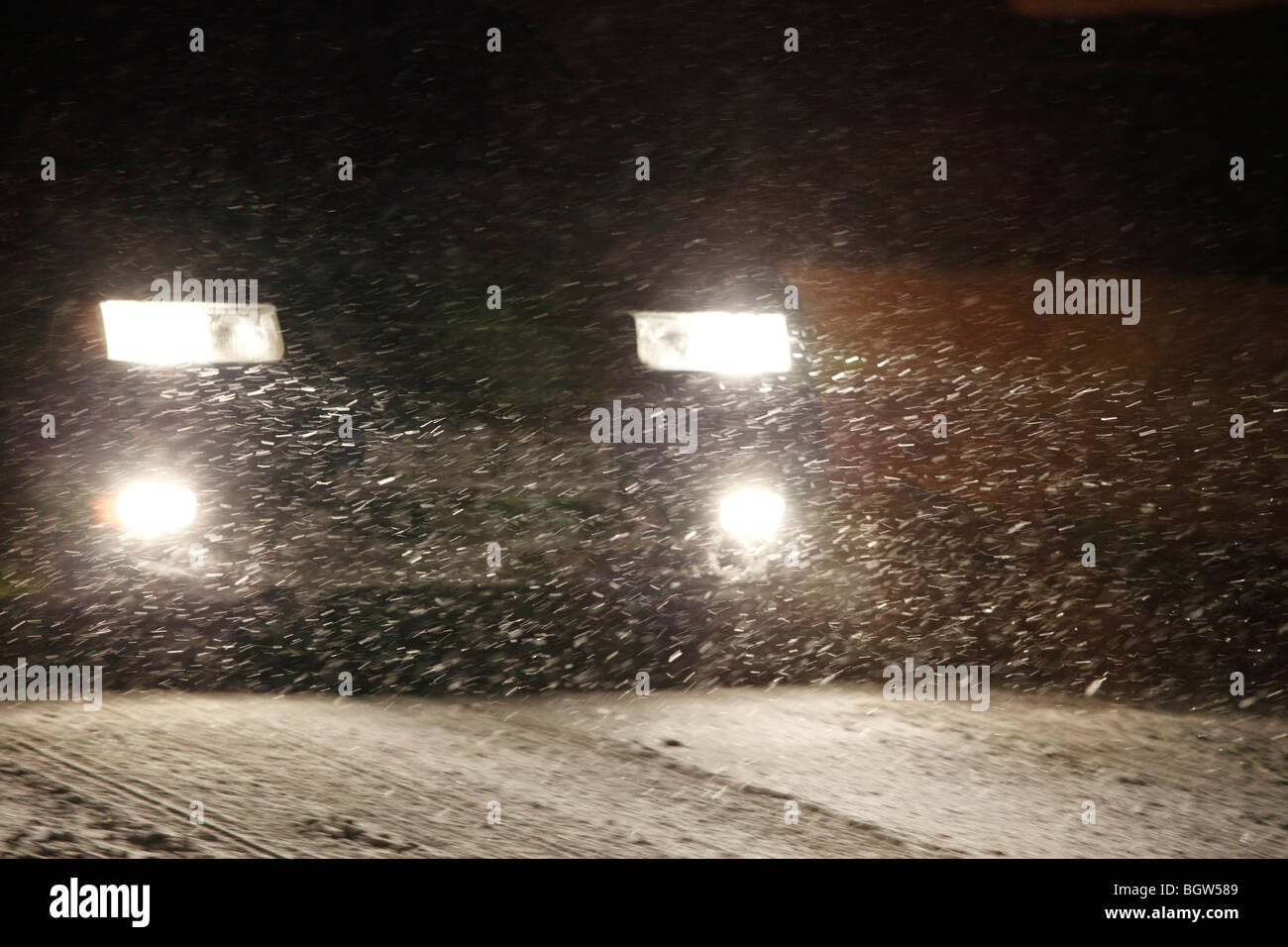 driving in a snowstorm at night in Germany Stock Photo - Alamy