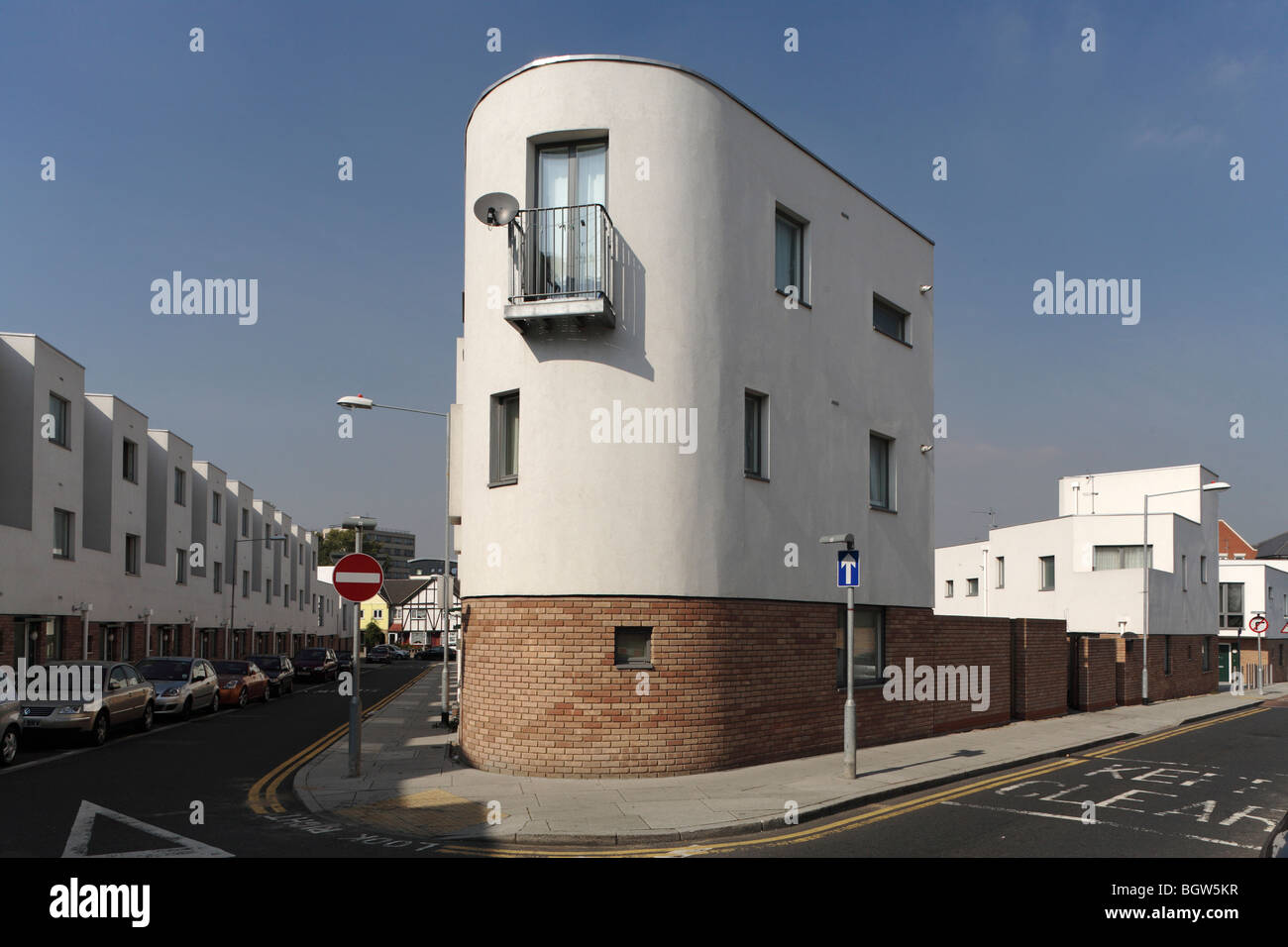tanner street gateway, corner house with balcony Stock Photo - Alamy