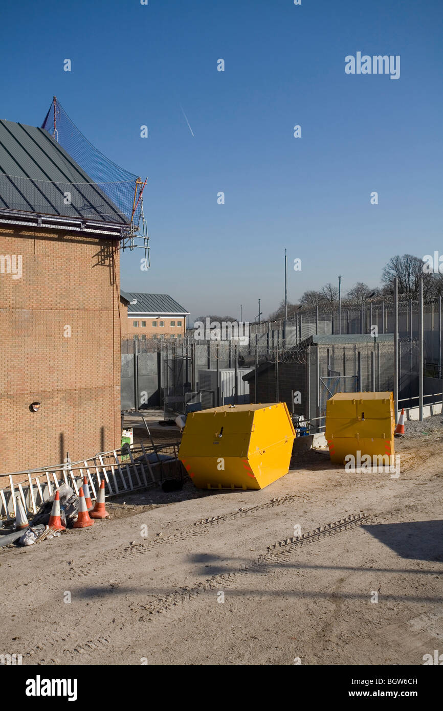high down prison construction of new cell block - lockable skips Stock ...