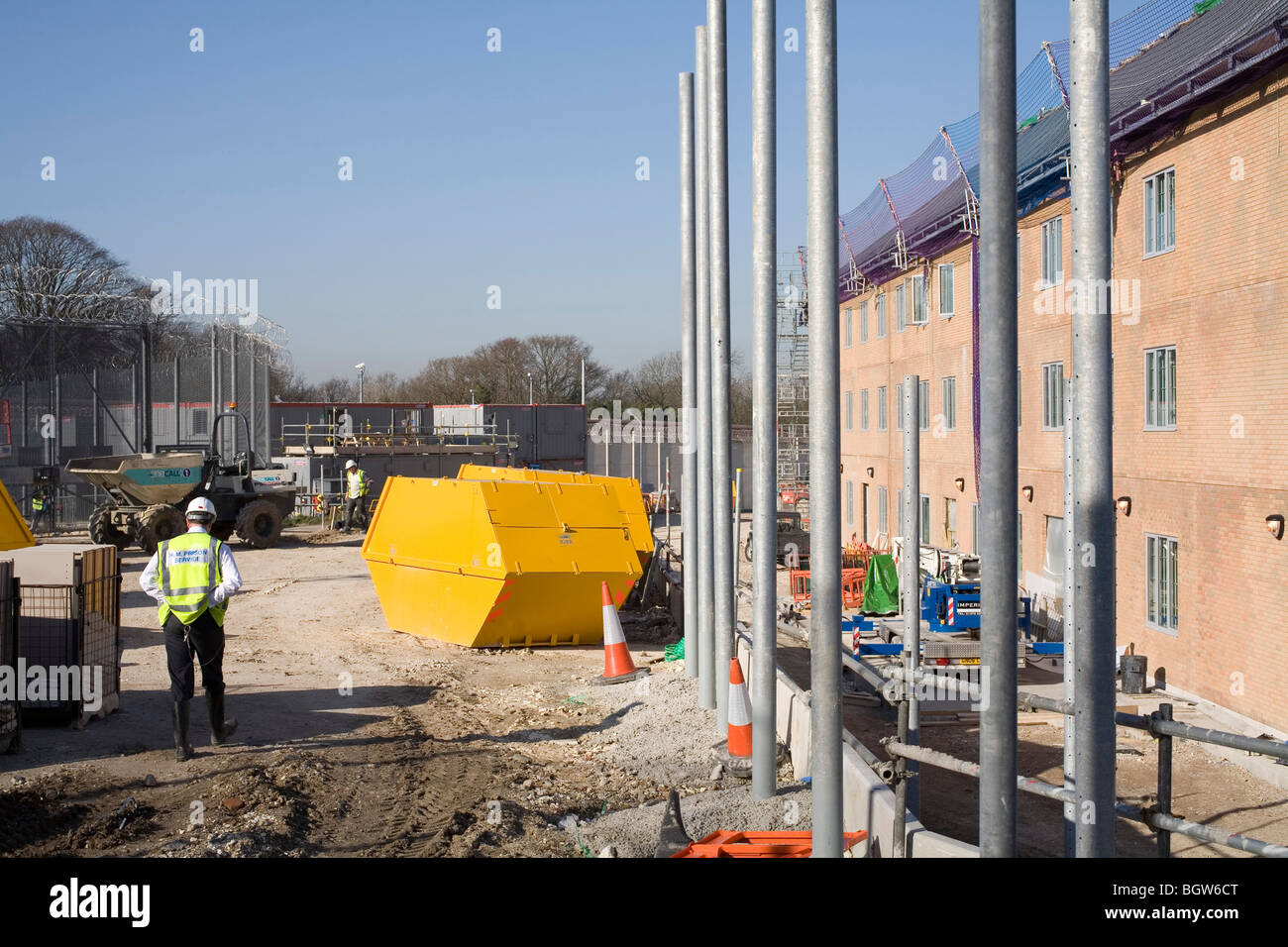 high down prison construction of new cell block - lockable skips Stock ...