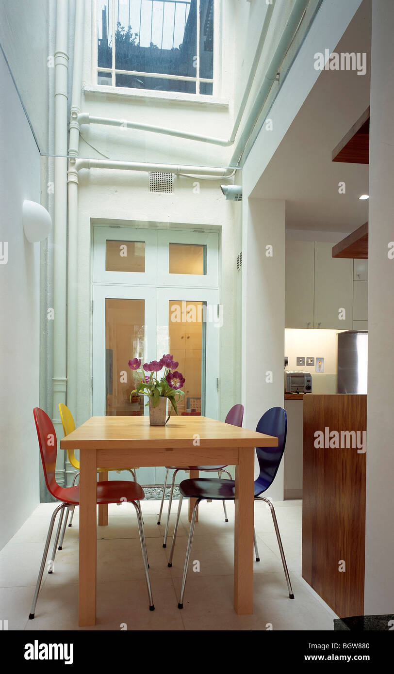 private house dining table in glazed conservatory Stock Photo - Alamy