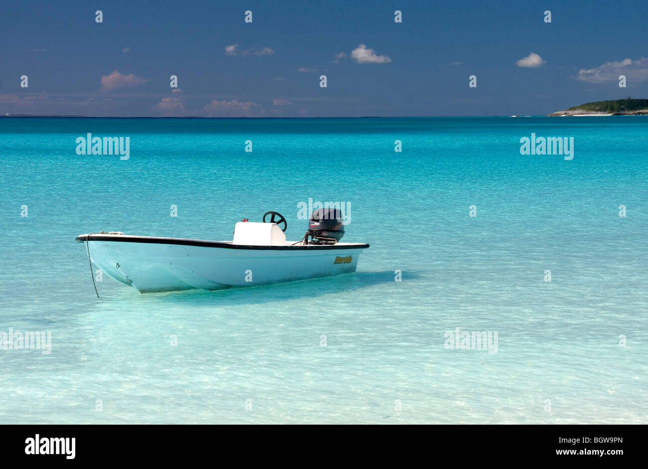 A small motorboat is anchored in the Caribbean Sea Stock Photo - Alamy