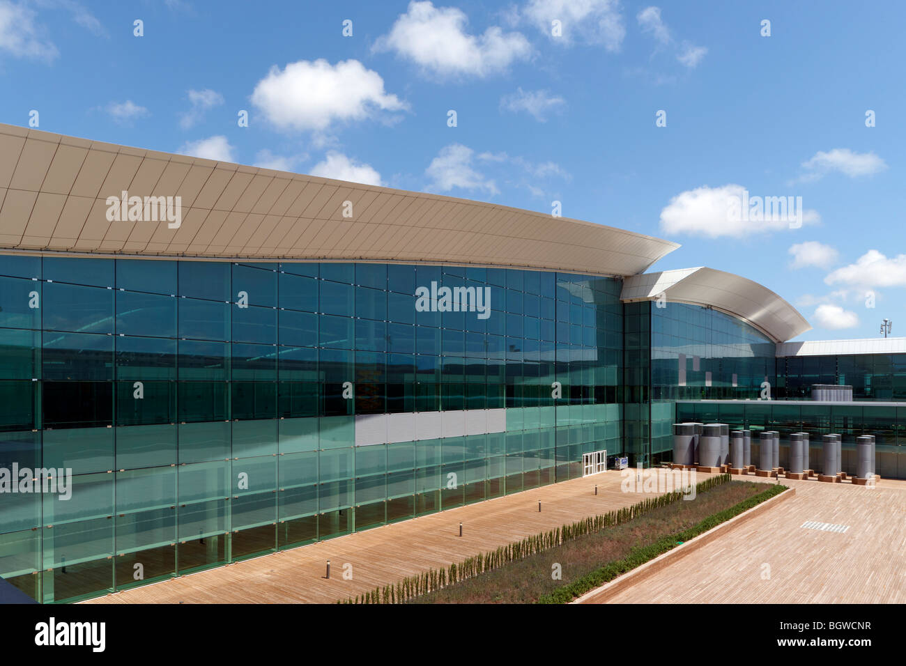 general exterior afternoon view of main terminal building showing glass ...