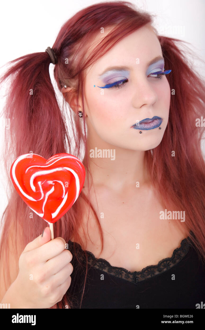 girl with lolly looking patronizingly Stock Photo - Alamy