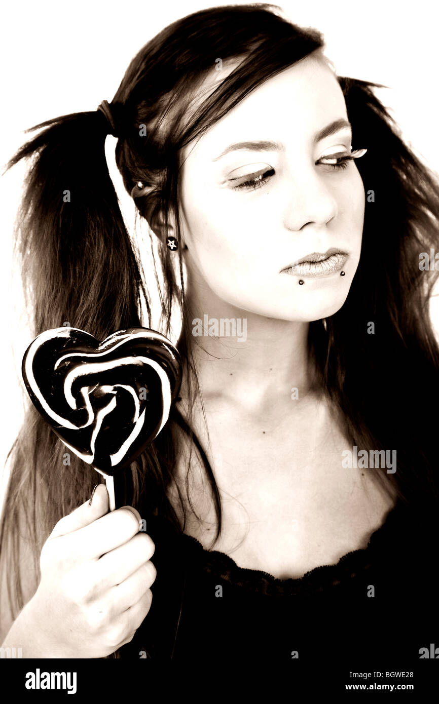 girl with lolly looking patronizingly Stock Photo - Alamy