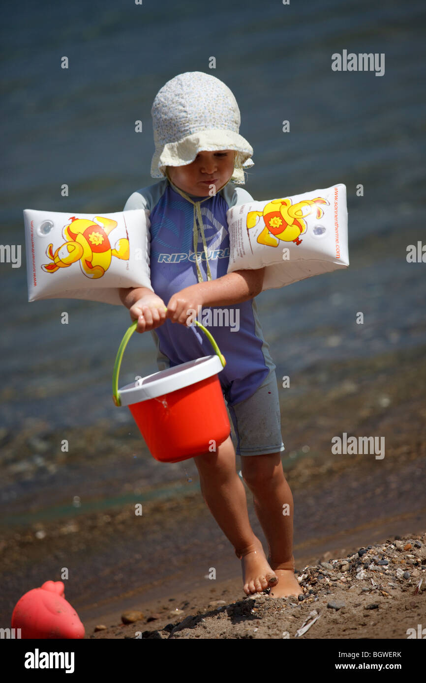 Girl child carry water bucket hi-res stock photography and images - Alamy