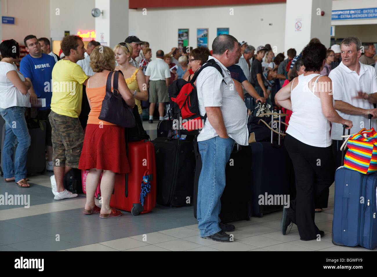 waiting people queue on airport Stock Photo - Alamy