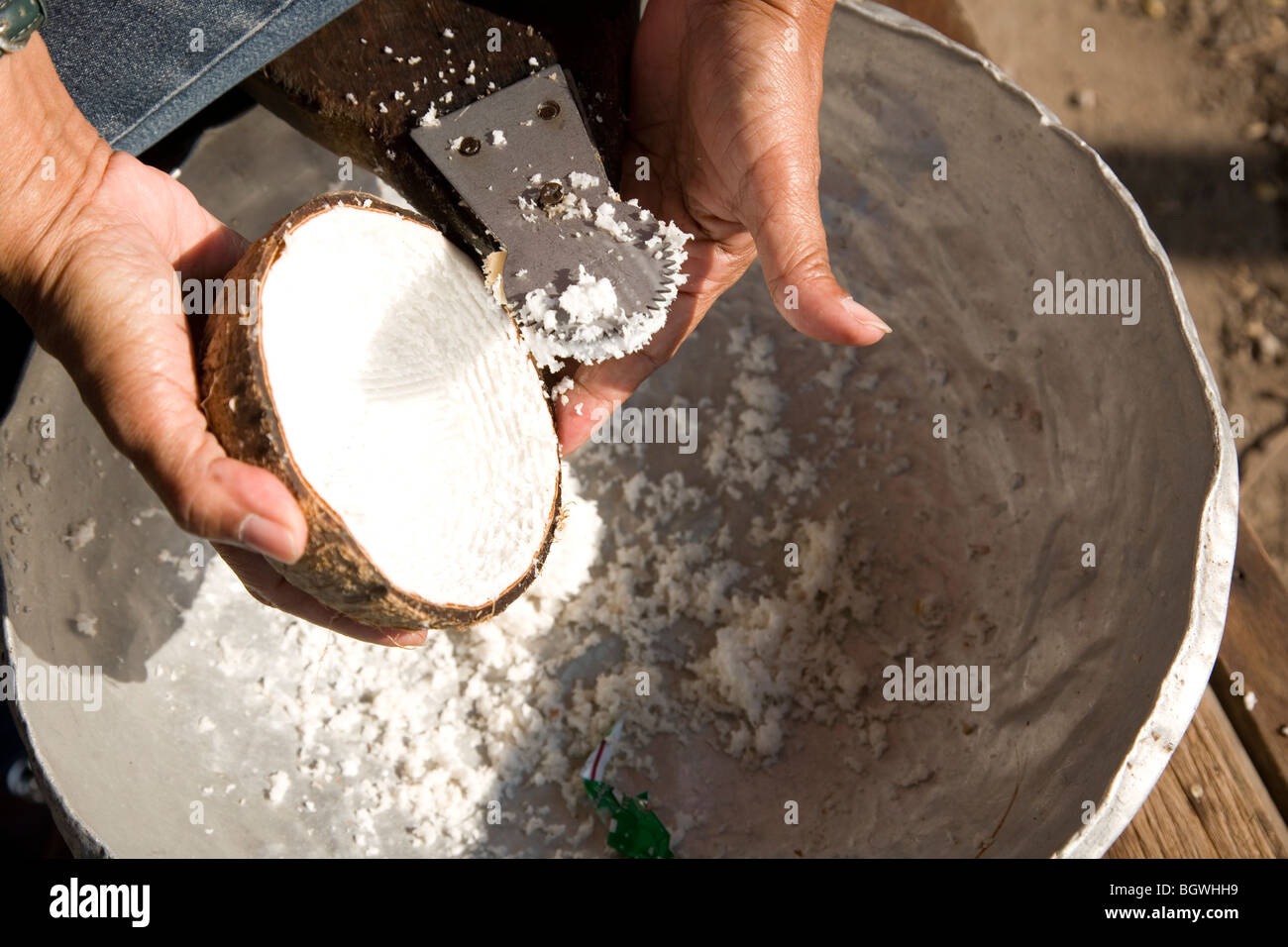 Grating a Coconut - Damnoen Saduak Stock Photo - Alamy