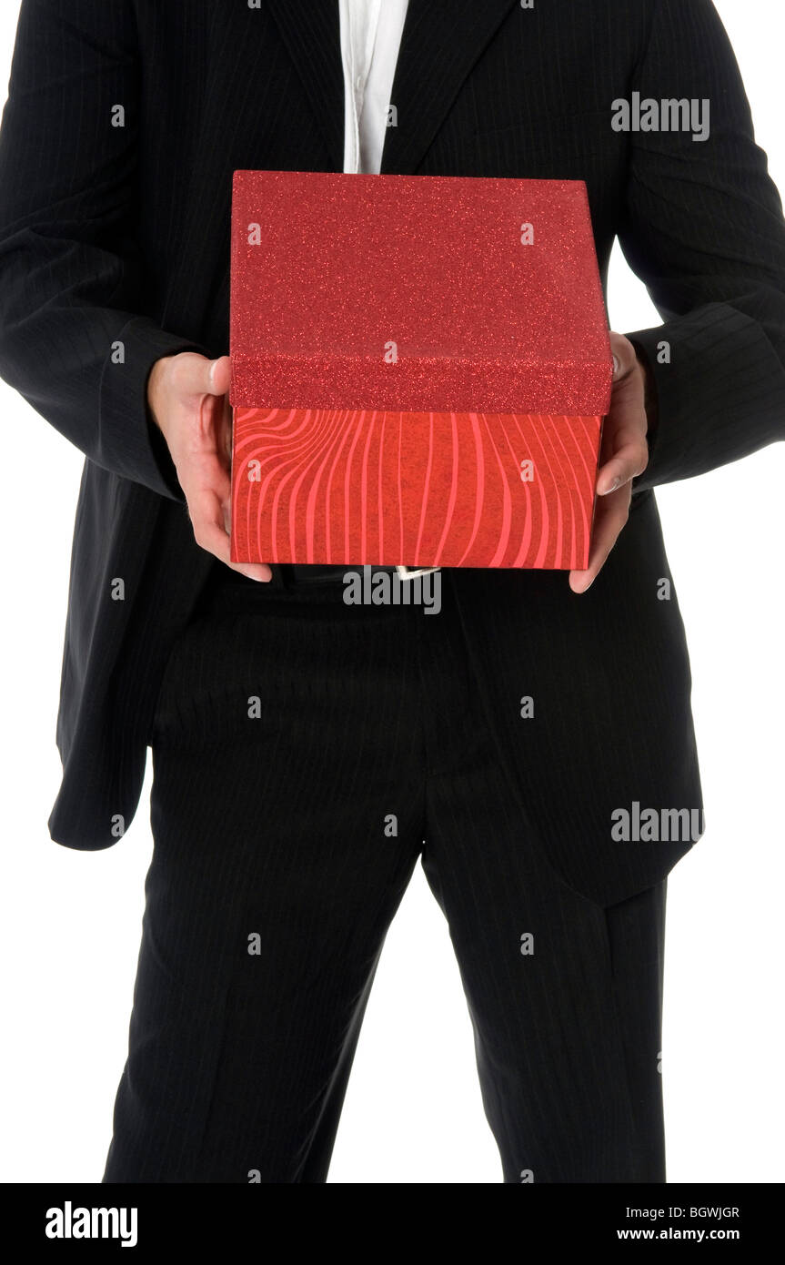 Man holding present Stock Photo - Alamy
