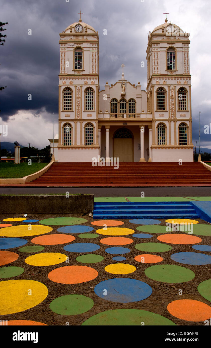 Beautiful old cathedral church and painted dots on pavement in Sarchi ...