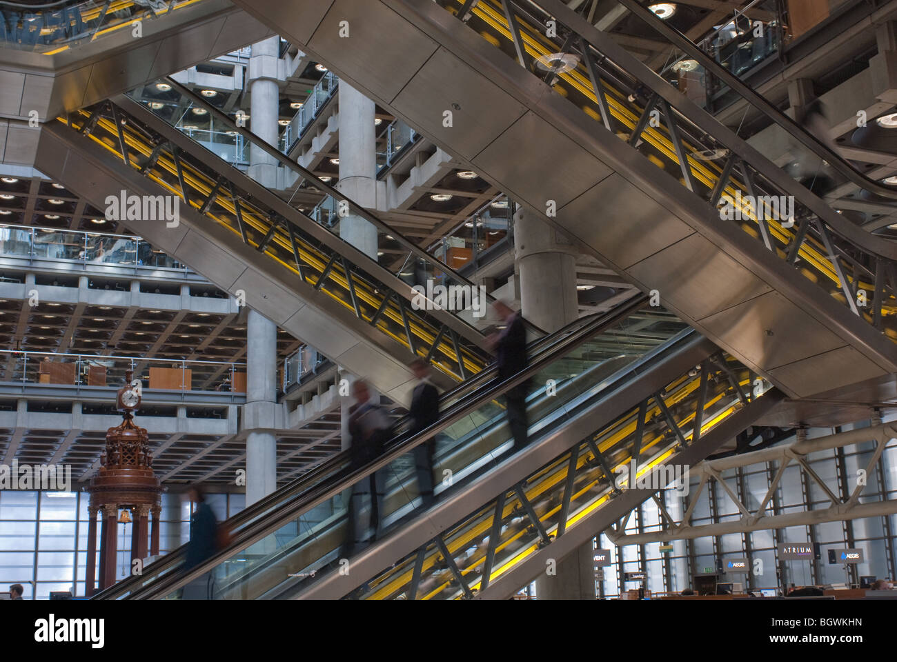 LLoyds of London interior,showing escalator and Lutine Bell Stock Photo ...