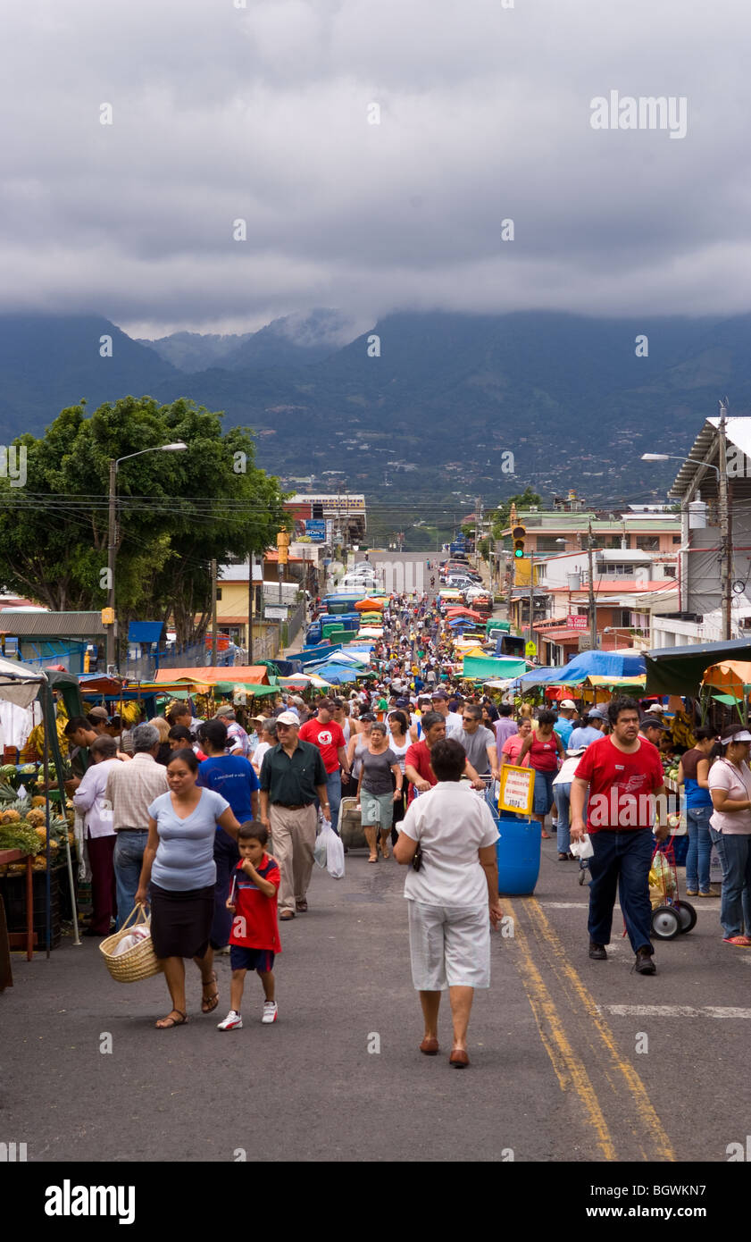 Crowds in Central Market with fruits and vegetables on street in Pavas ...