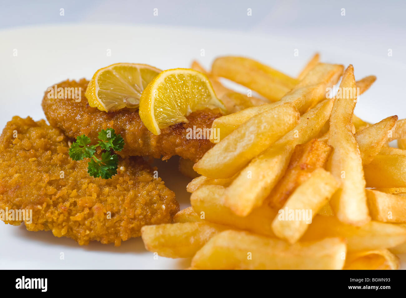 Schnitzel with chips Stock Photo - Alamy