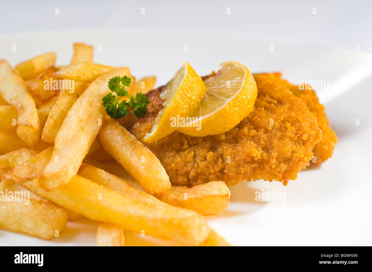 Schnitzel with chips Stock Photo - Alamy