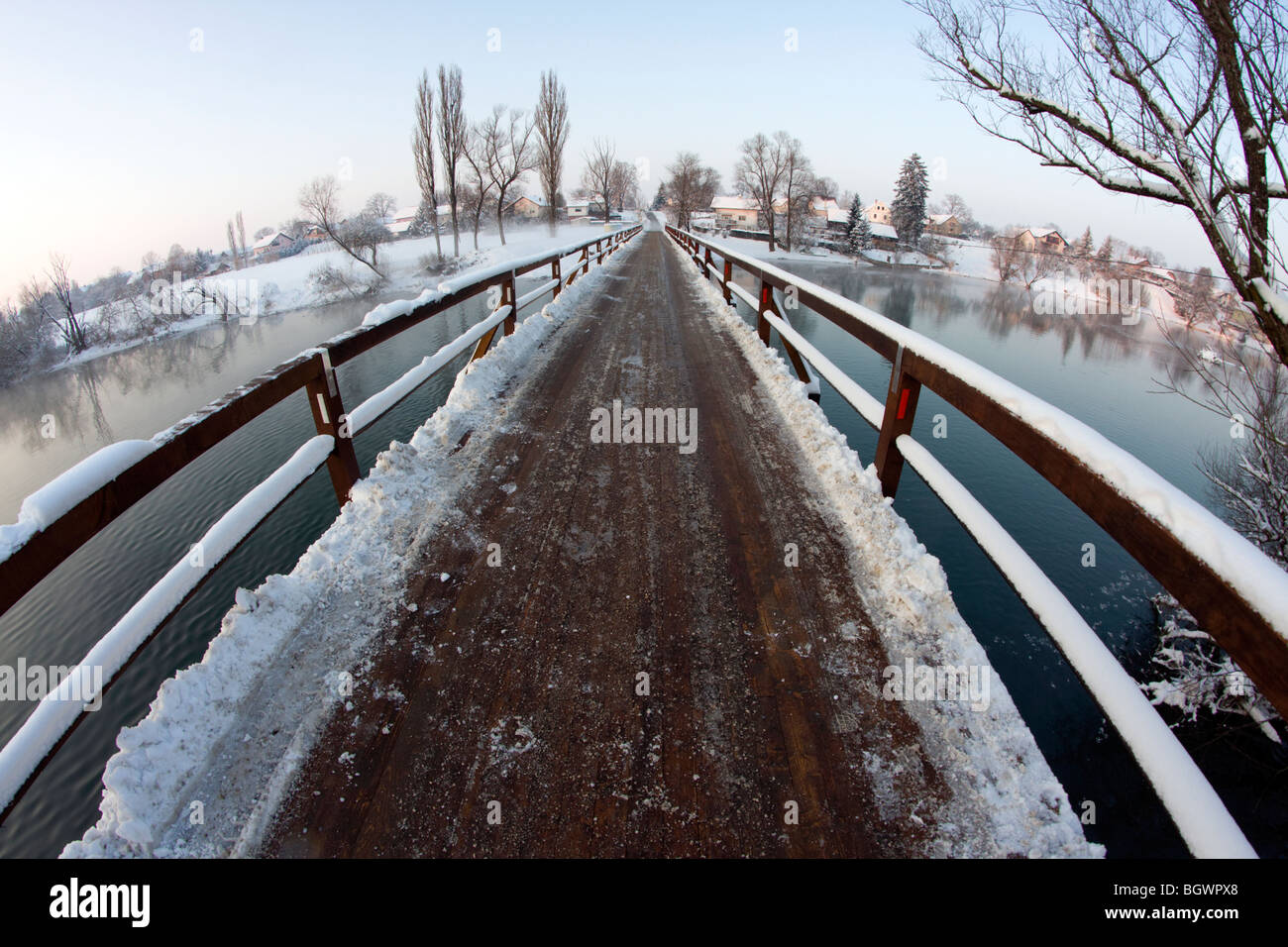 Winter wooden bridge river water cold village nature horizontal snow hi ...
