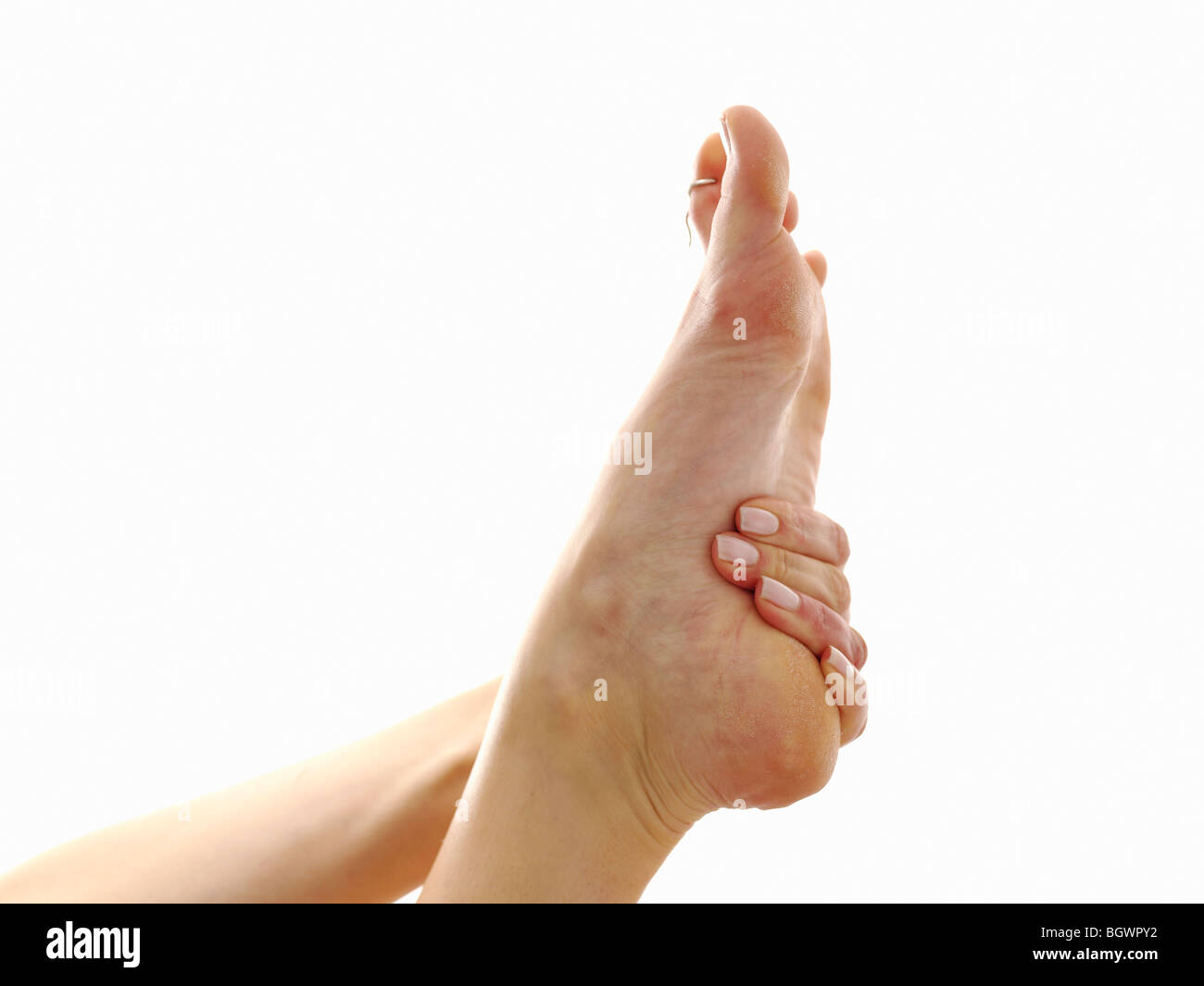 yoga pose hand and foot stretch Stock Photo - Alamy