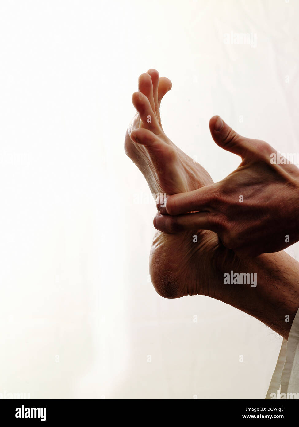 yoga pose hand and foot Stock Photo - Alamy