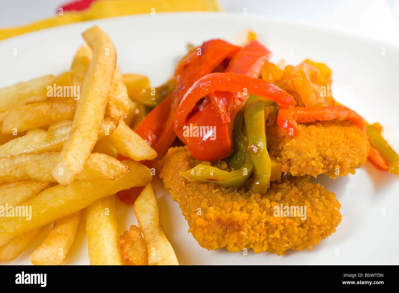 Schnitzel with chips Stock Photo - Alamy