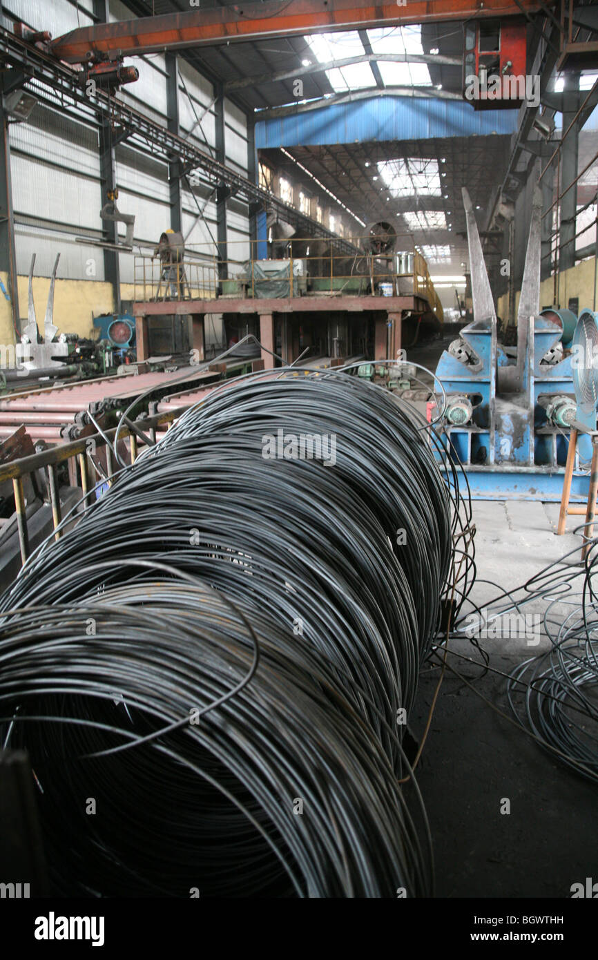 Coils of steel wire at Chinese steel mill Stock Photo - Alamy