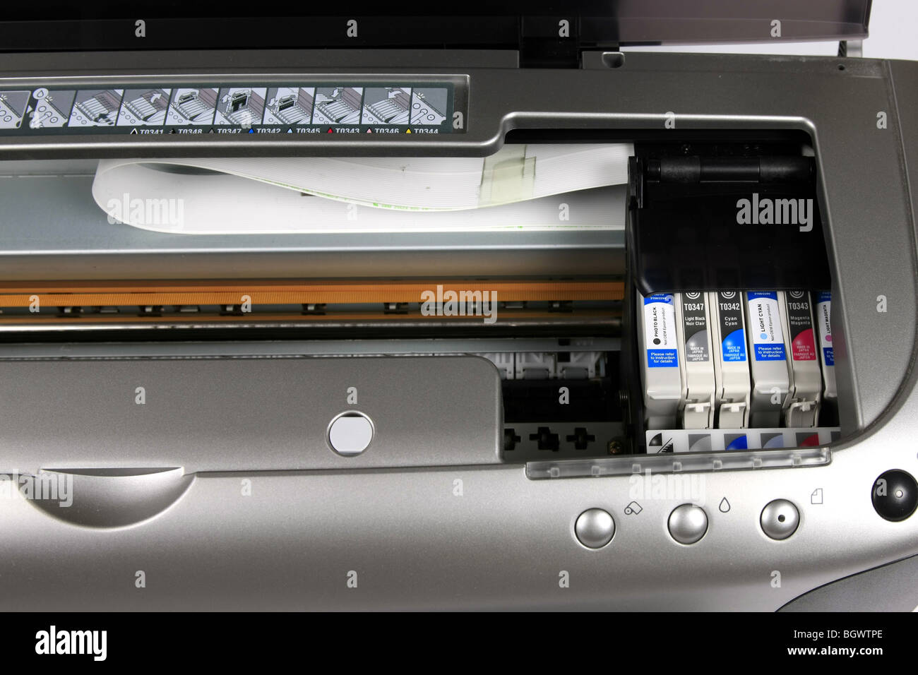 Inside an A3 Inkjet printer showing the cartridges and printing system ...