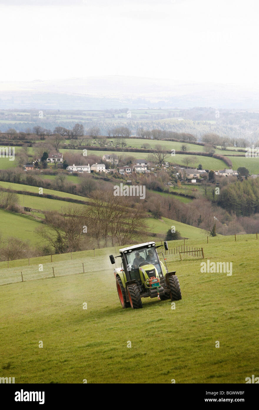 Tractor in a field Stock Photo - Alamy