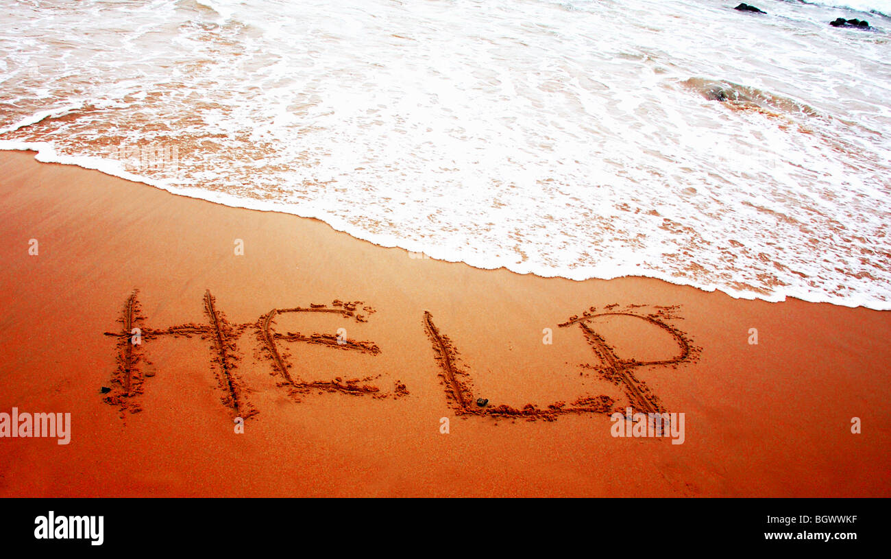 Sos written in the sand hi-res stock photography and images - Alamy