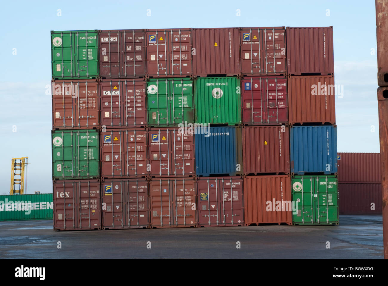 stack of shipping ships containers multi coloured Stock Photo - Alamy