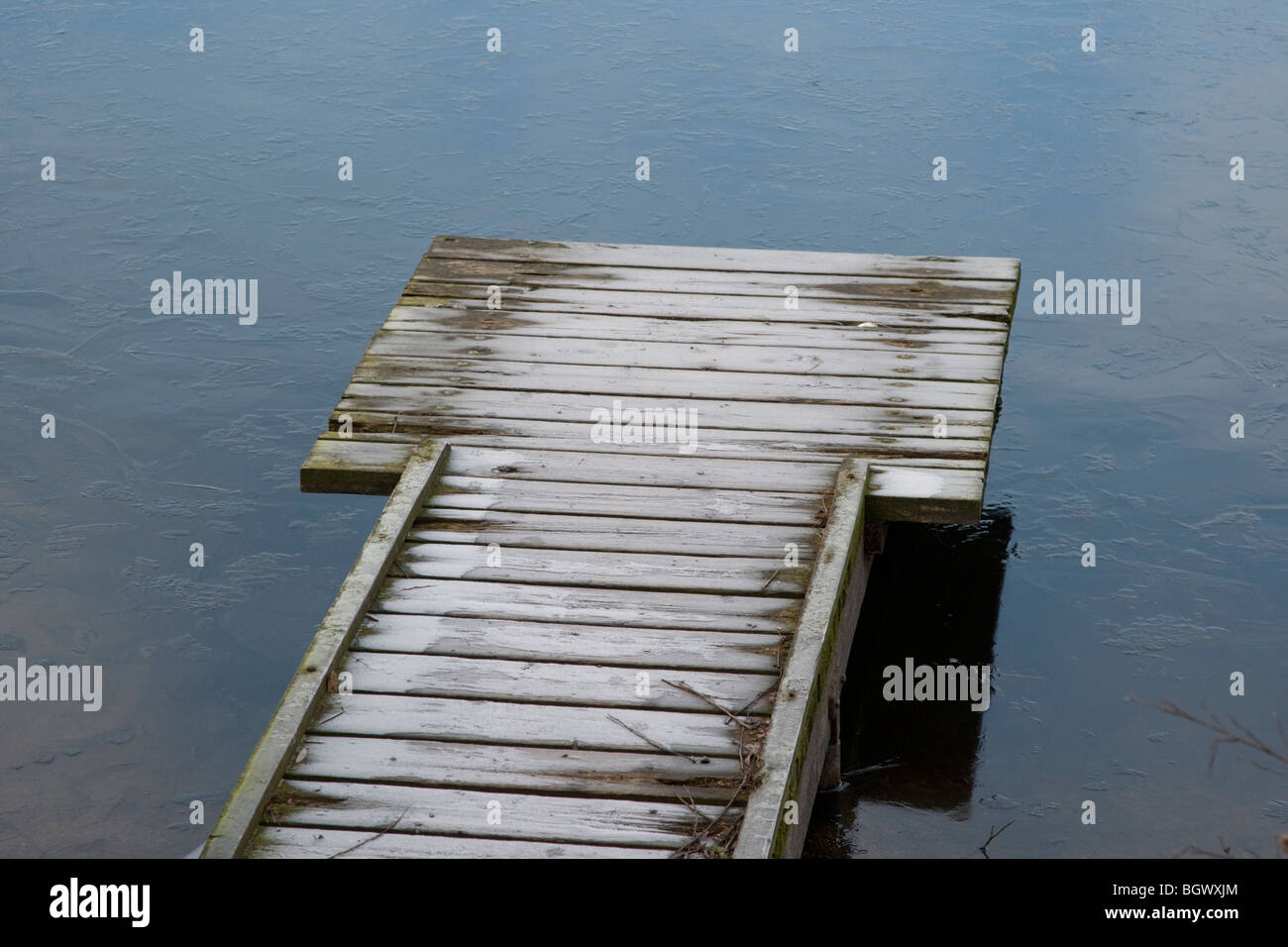 Frost covered jetty Stock Photo - Alamy