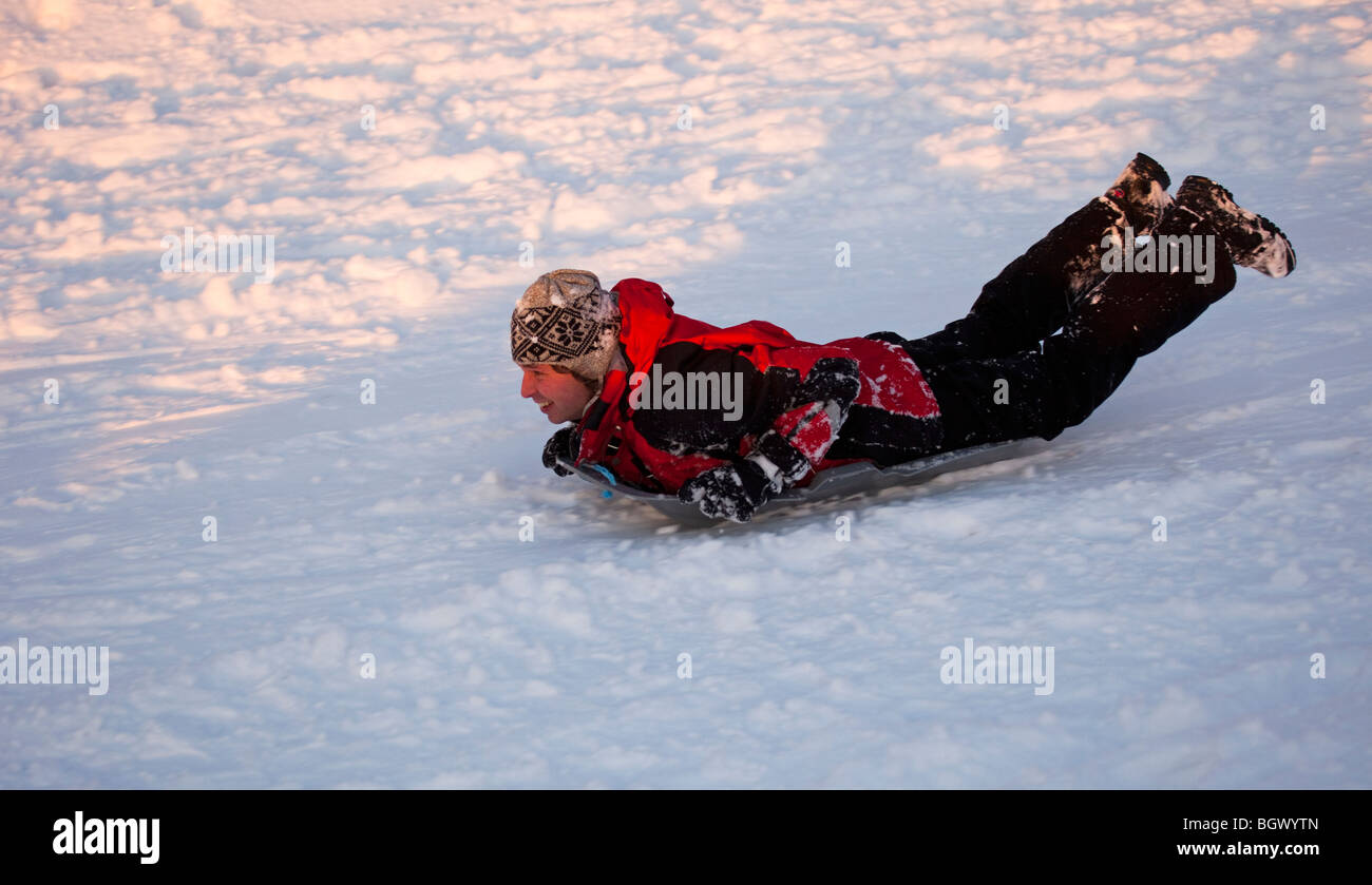 Sledging down hill hi-res stock photography and images - Alamy