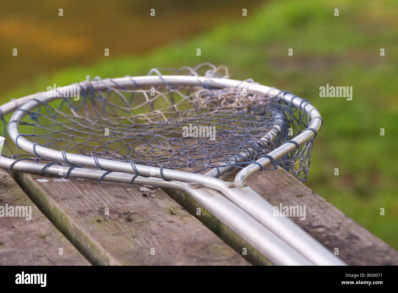 CLOSEUP FISHING NET SITTING ON BENCH Stock Photo - Alamy