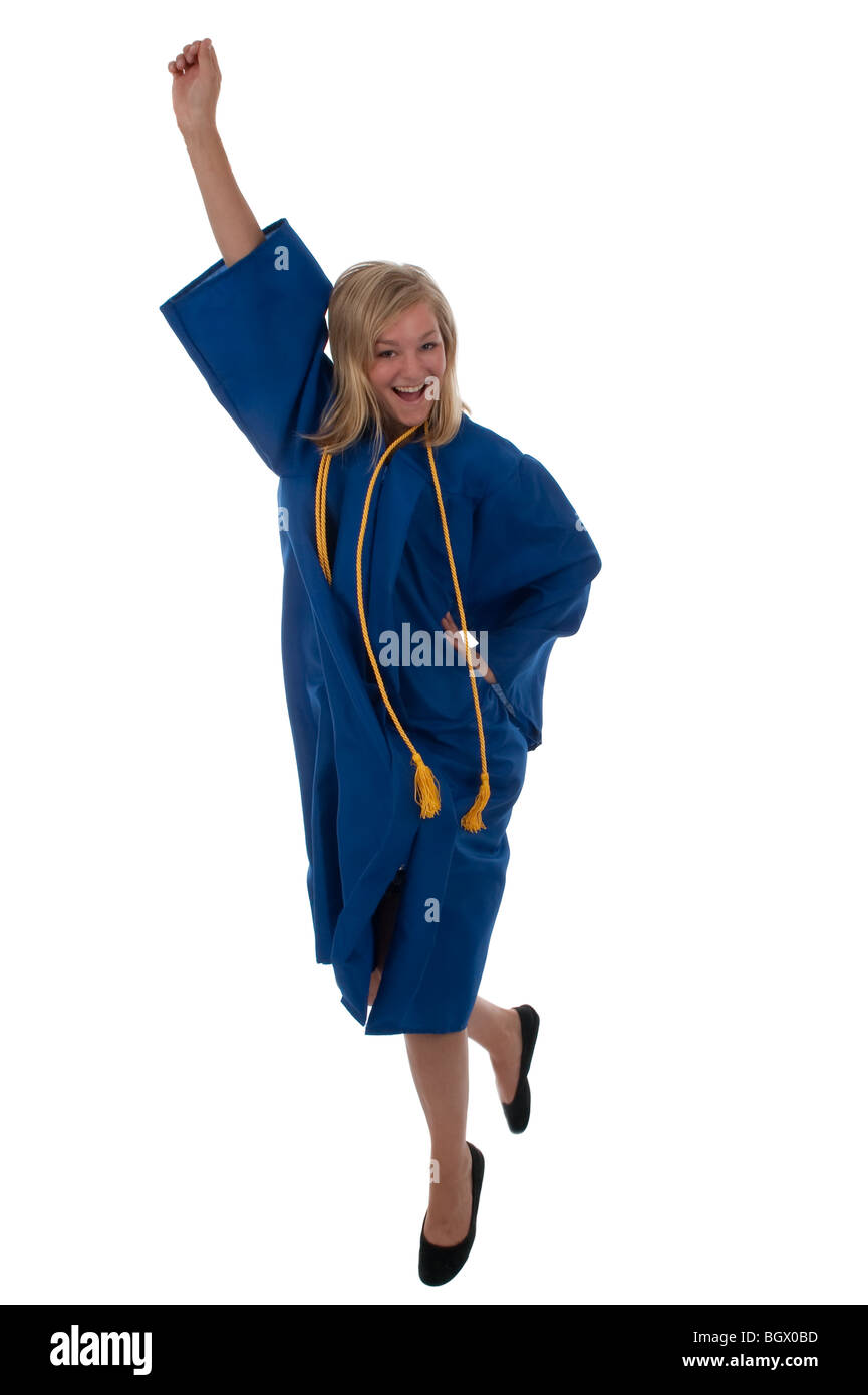 Teen girl in a graduation gown jumping for joy Stock Photo - Alamy