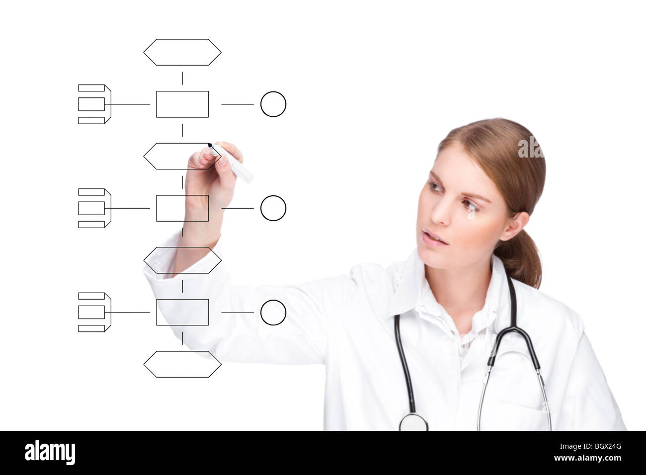 Young doctor is drawing some graphics. Full isolated studio picture ...