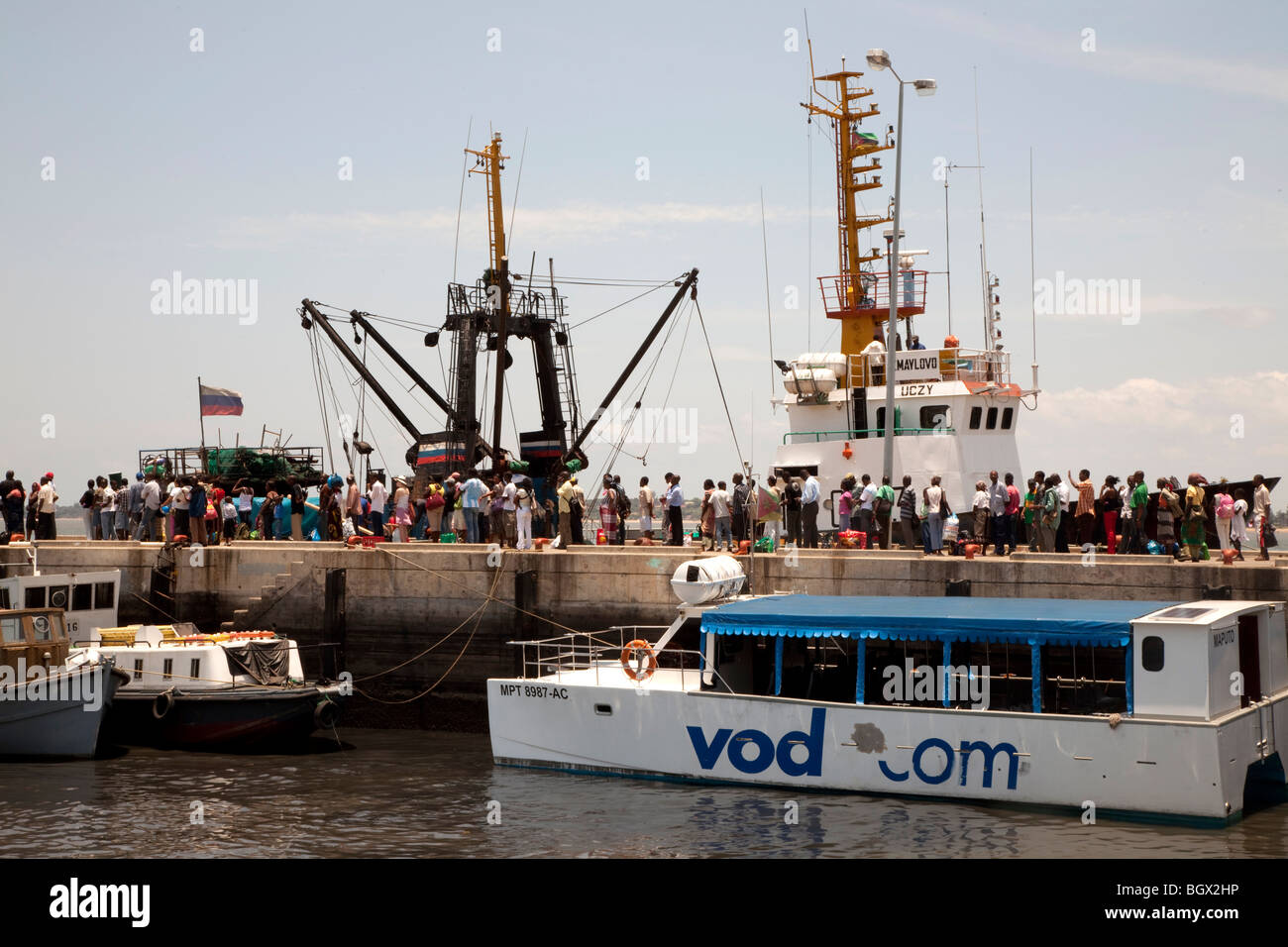 Crowd of people waiting to catch the ferry in Maputo, Mozambique Stock ...