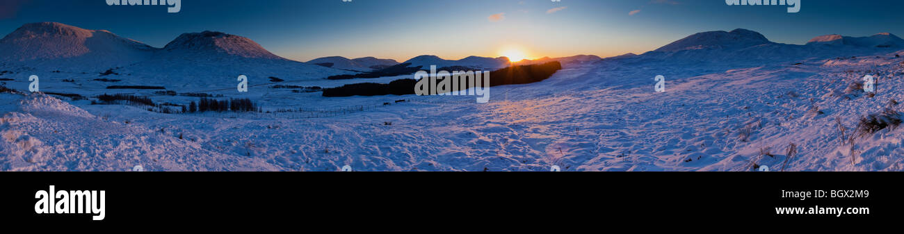 Panorama of a sunset over the Scottish Munro Achallader An Torr in the ...