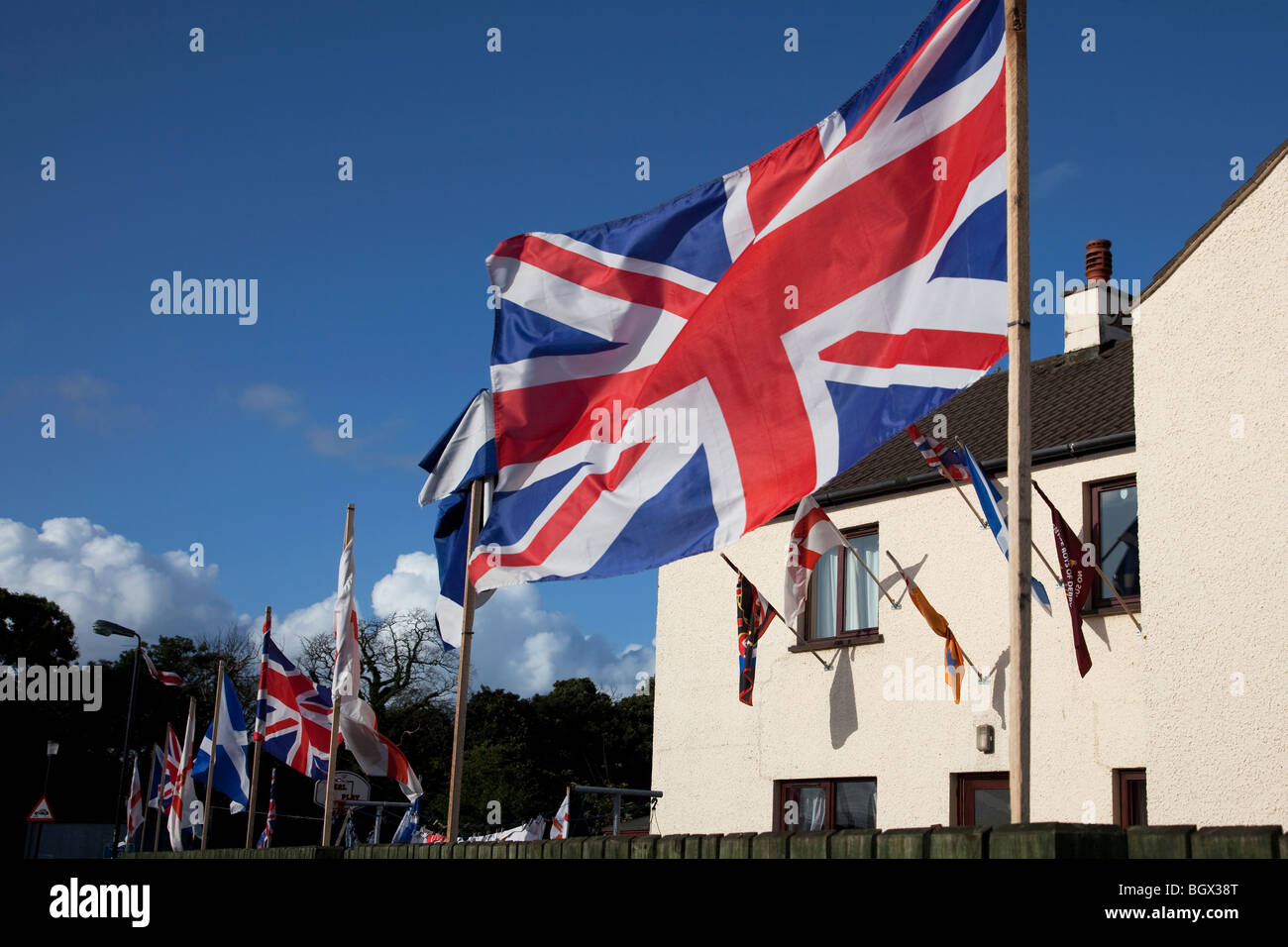 Flag waving at a private house in Bushmills, Antrim, Northern Ireland ...