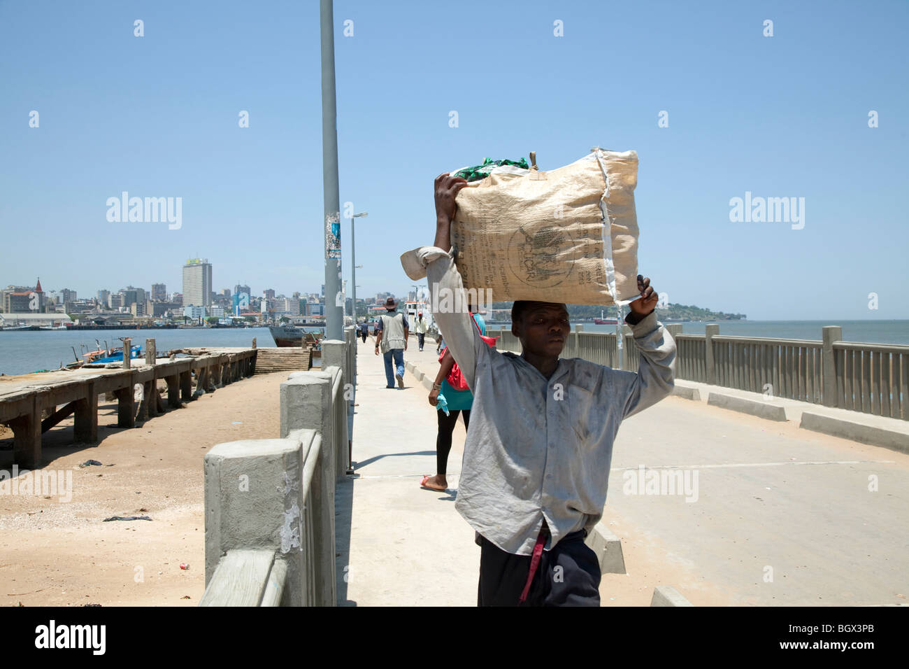 Indian man carrying sack hi-res stock photography and images - Alamy