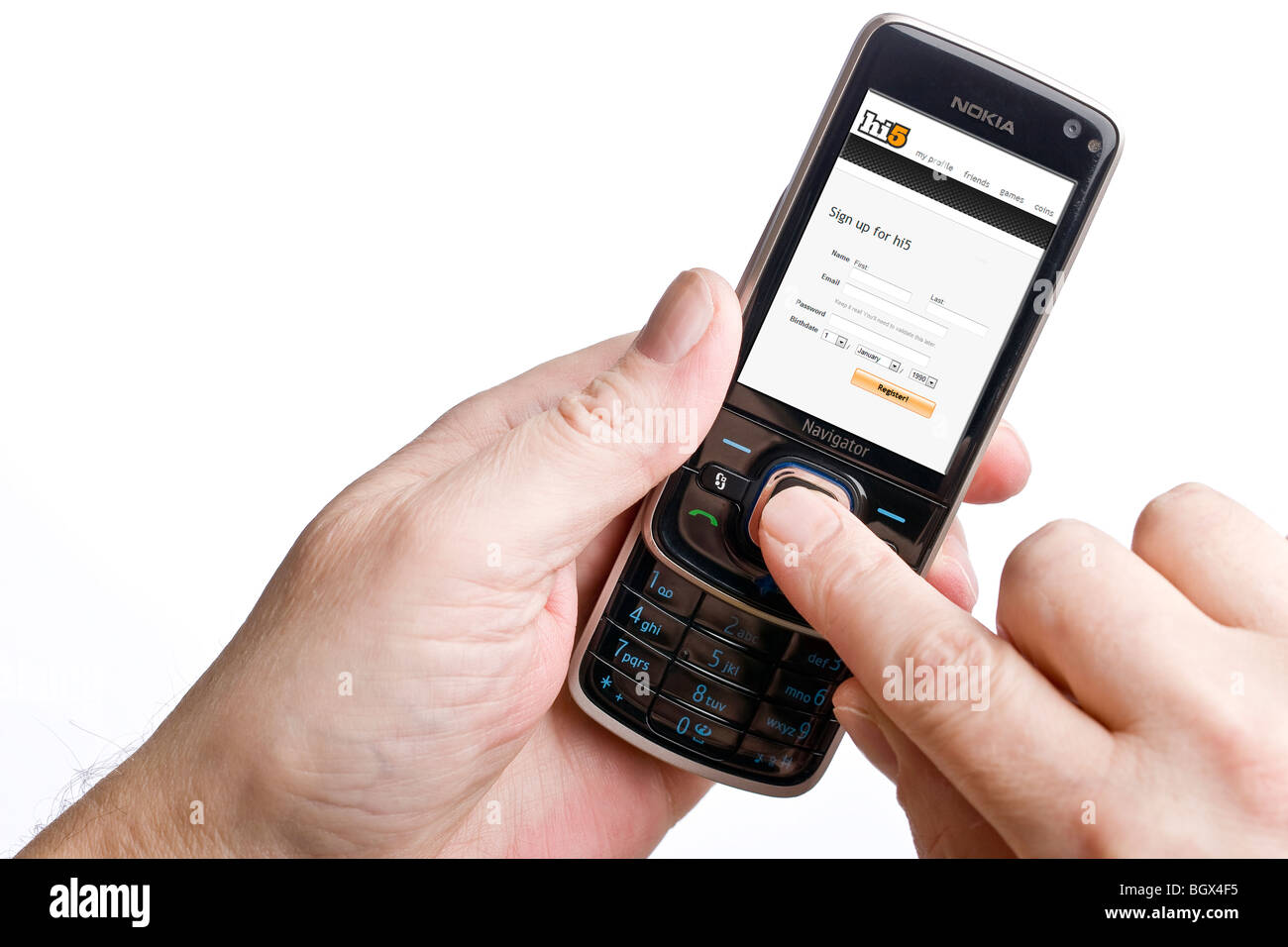 Using HI5.com on a mobile phone Stock Photo - Alamy