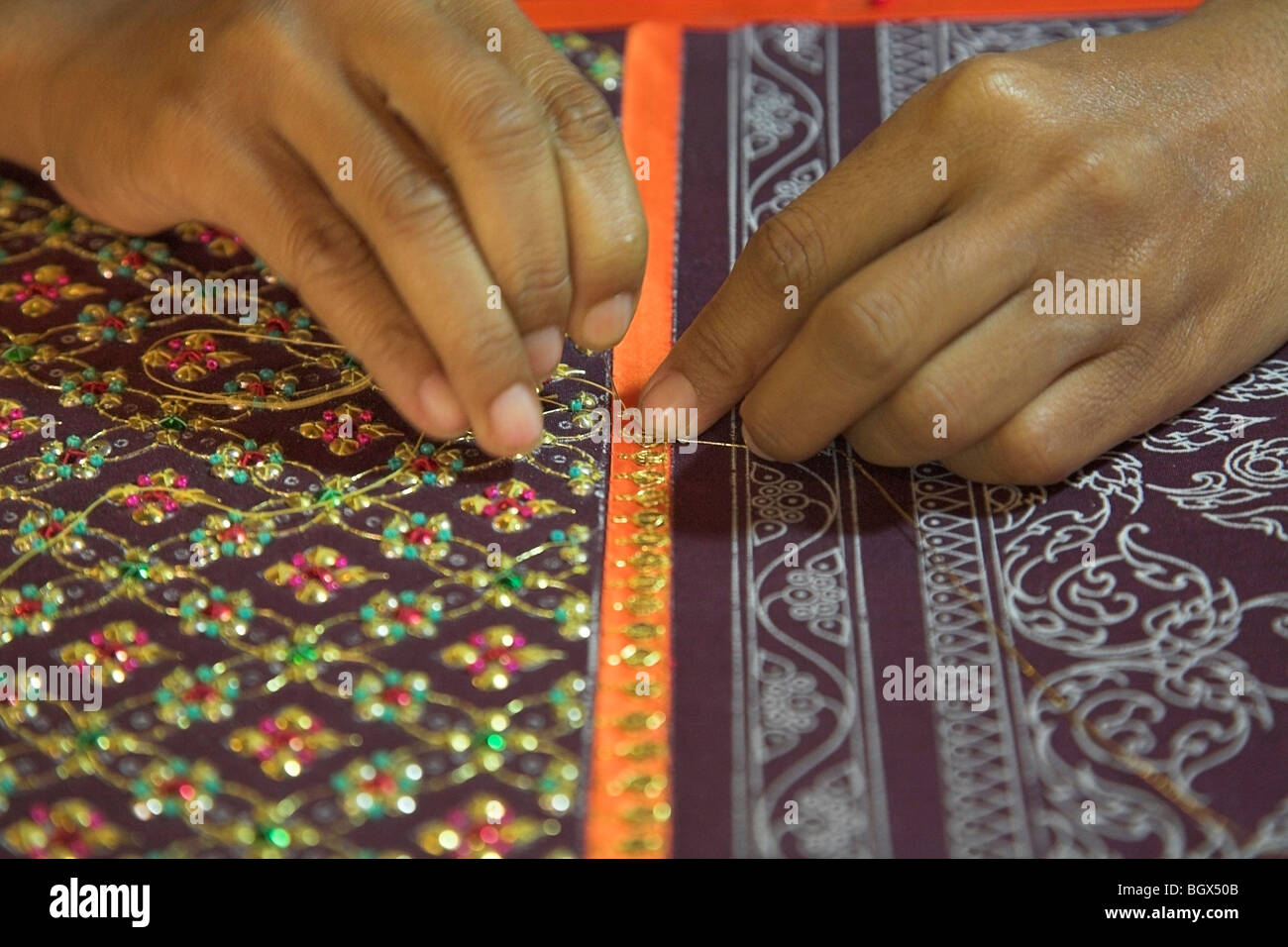 Embroidering fabrics hi-res stock photography and images - Alamy