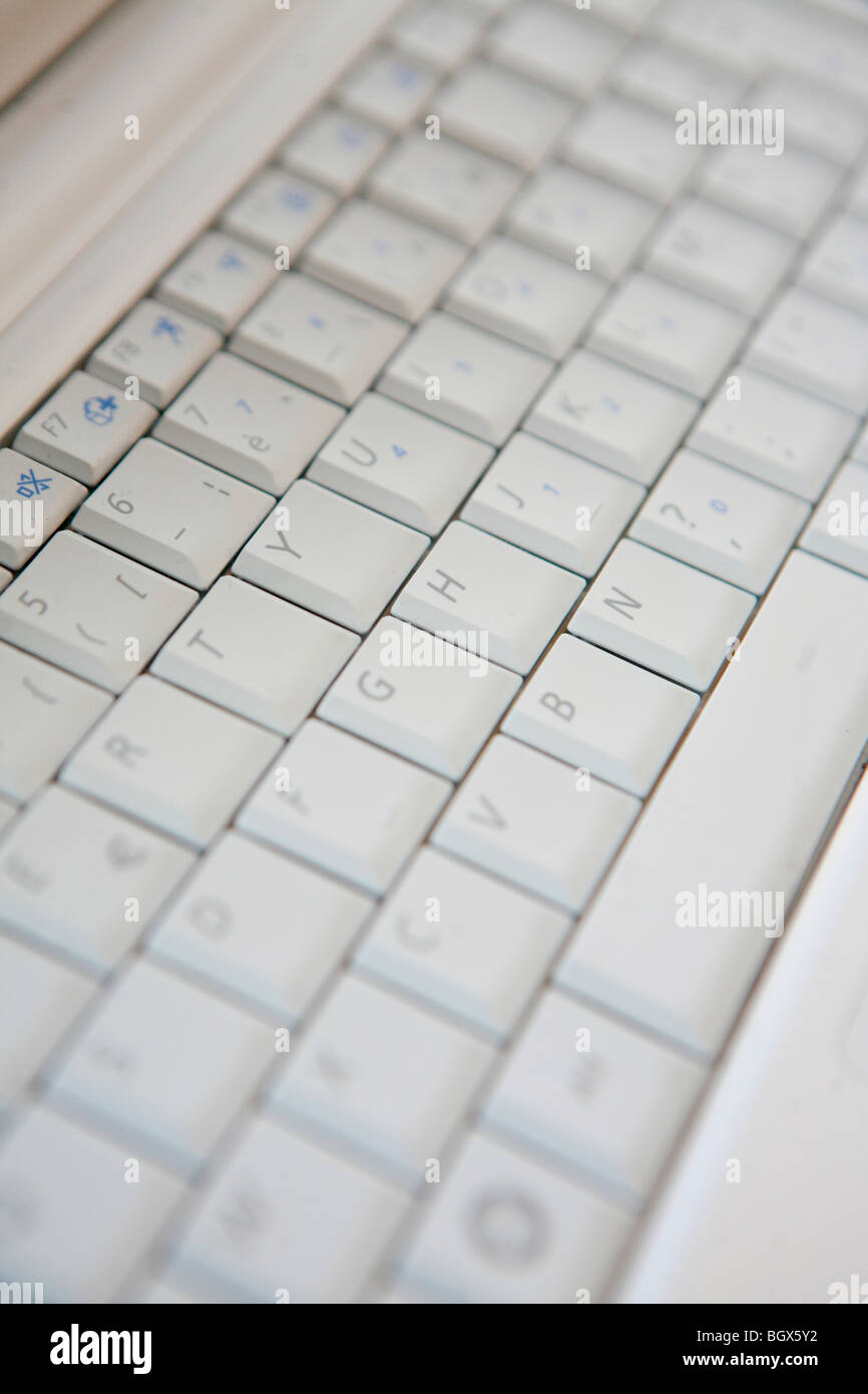 Very close shot of a white laptop keyboard showing letters Stock Photo ...